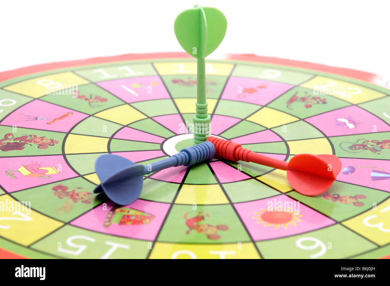 object on white toy Dart arrows Stock Photo - Alamy