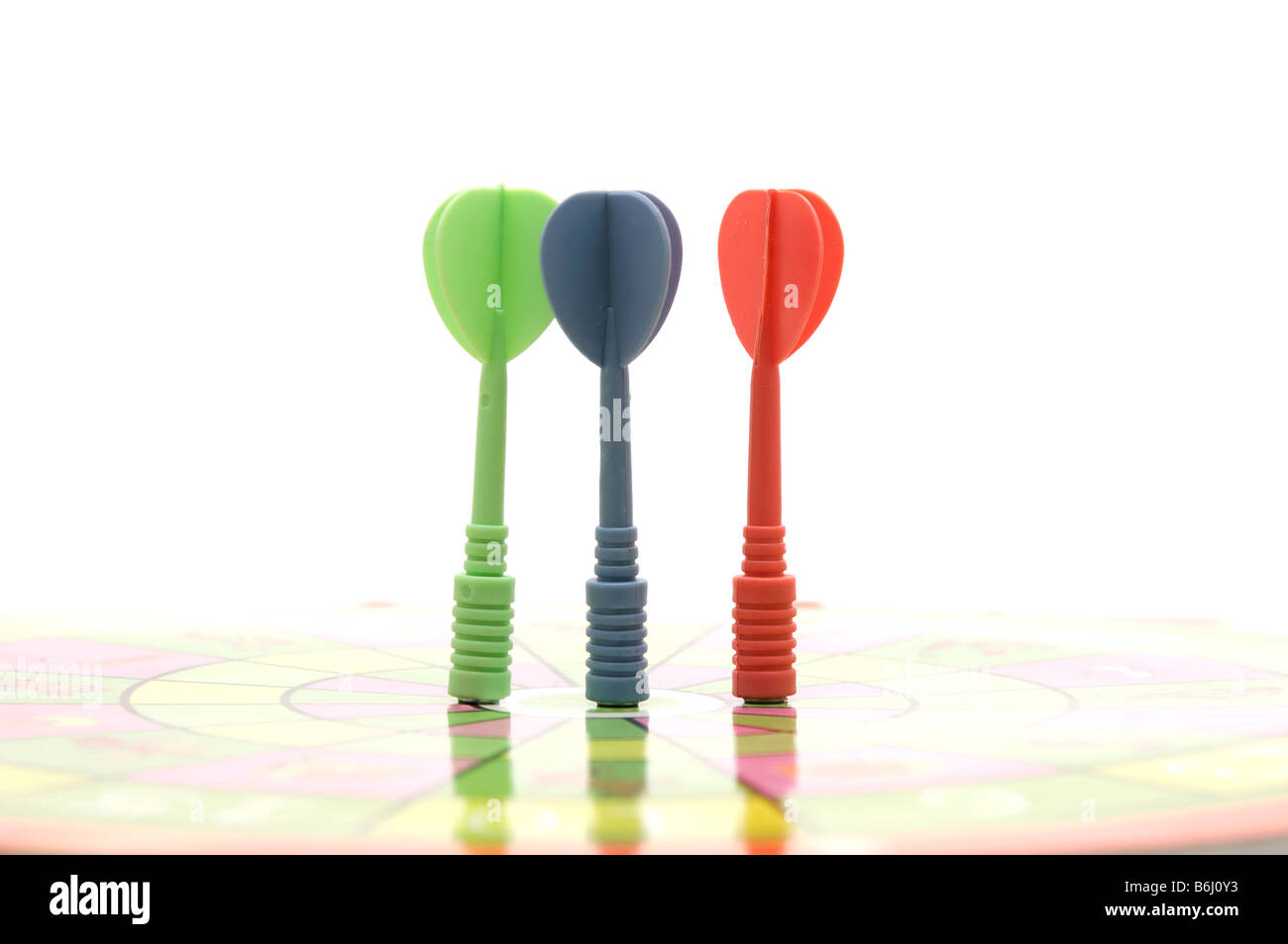 object on white toy Dart arrows Stock Photo - Alamy