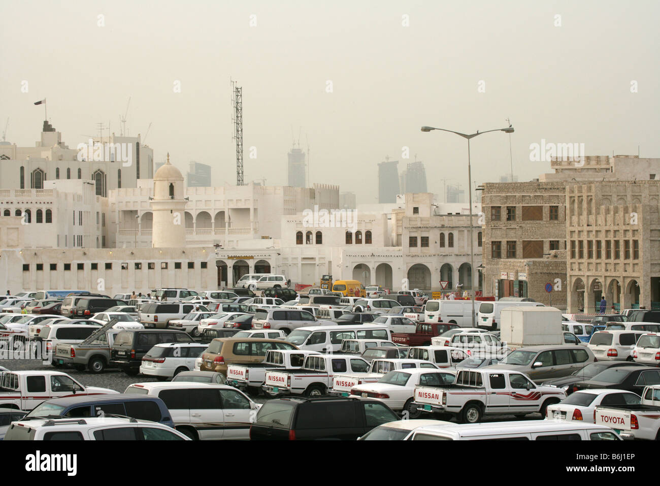 Cars and pick-up trucks in downtown parking lot, Doha, Qatar, Middle ...