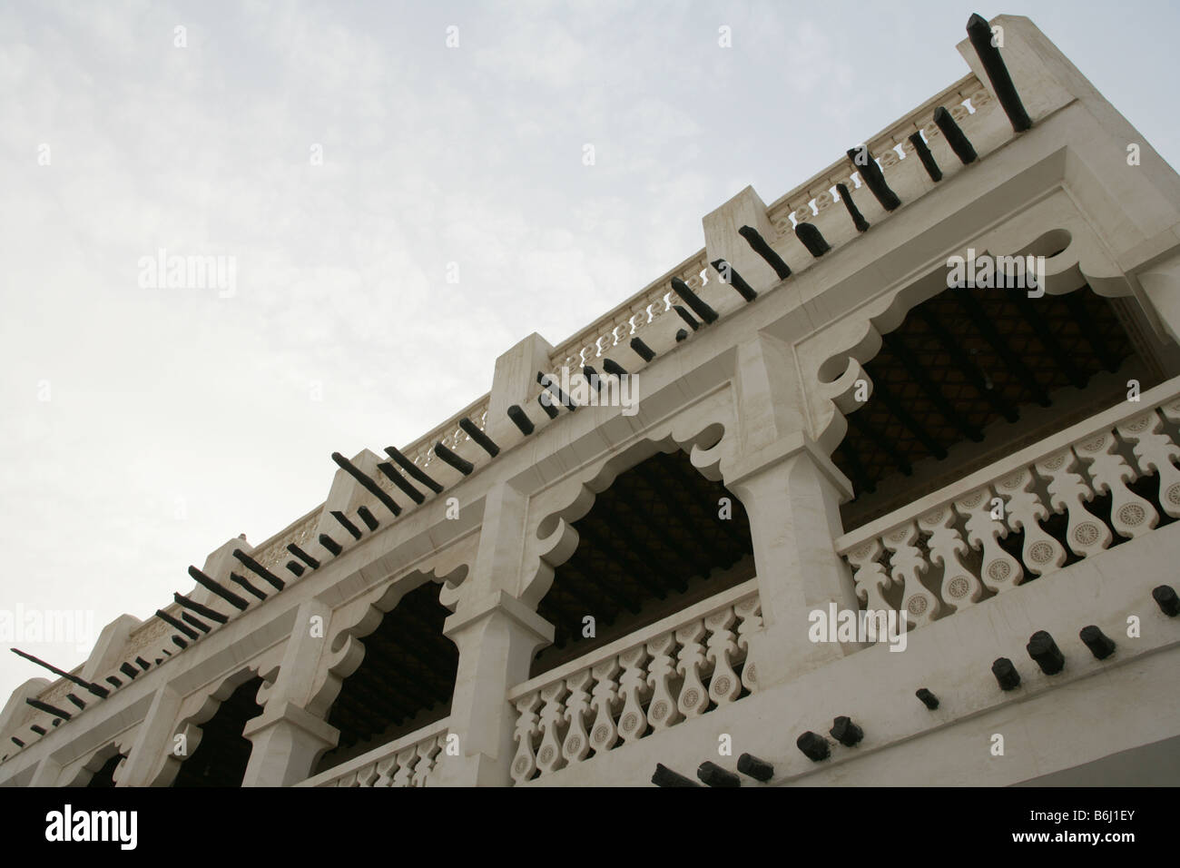 Traditional building with projecting shandal beams in Doha, Qatar Stock ...
