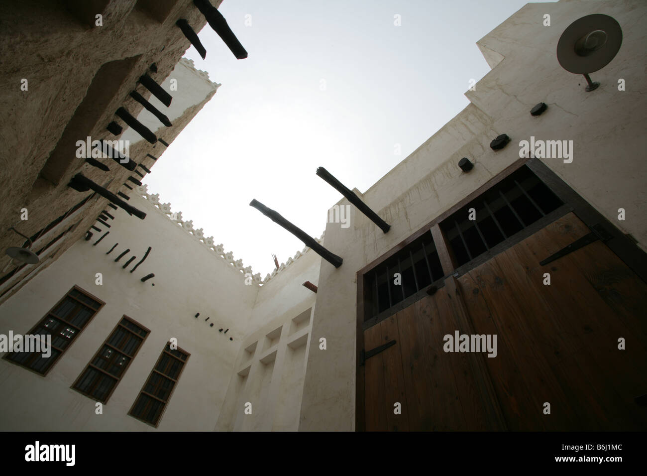 Traditional buildings with projecting 'shandal' beams in Doha, Qatar ...