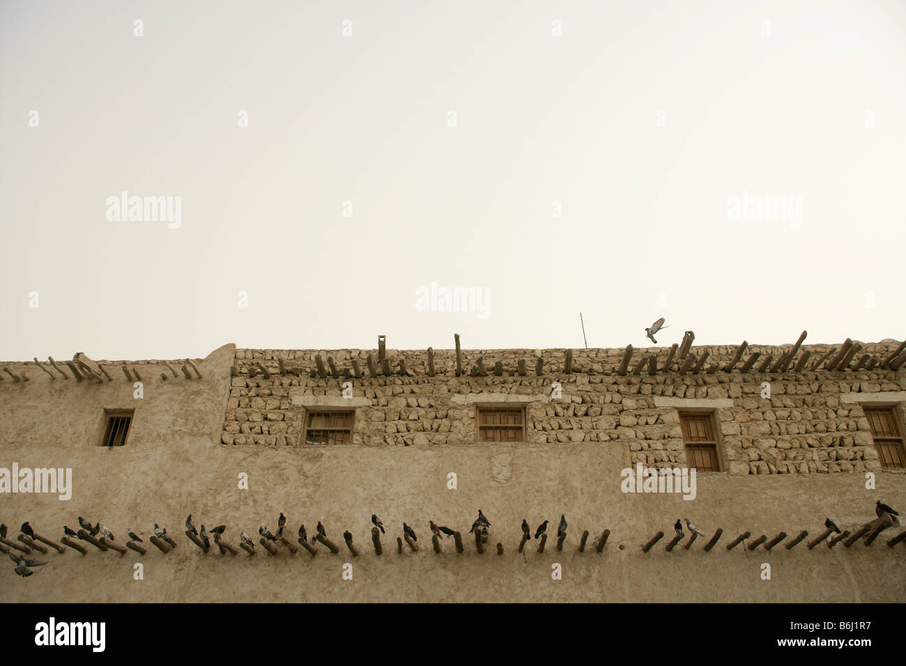 Traditional building in Doha with projecting 'shandal' beams, Qatar ...