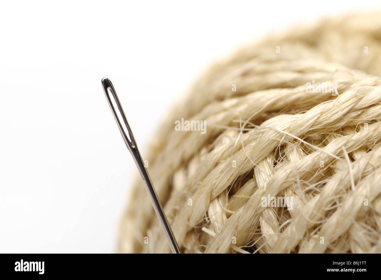 Needle and rope ball Stock Photo - Alamy