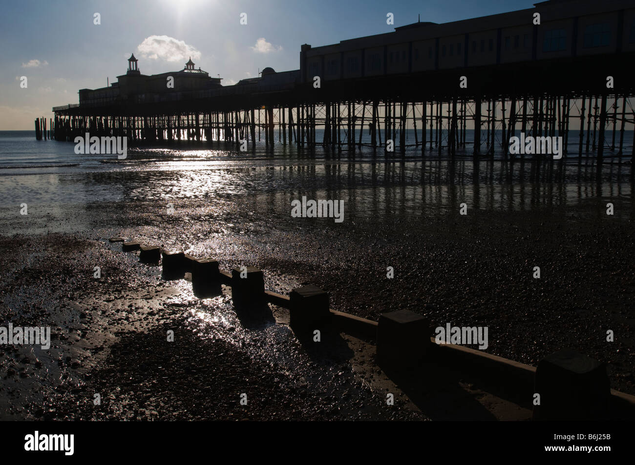 UNITED KINGDOM, ENGLAND, 9th December 2008. Hastings Pier in silhouette ...