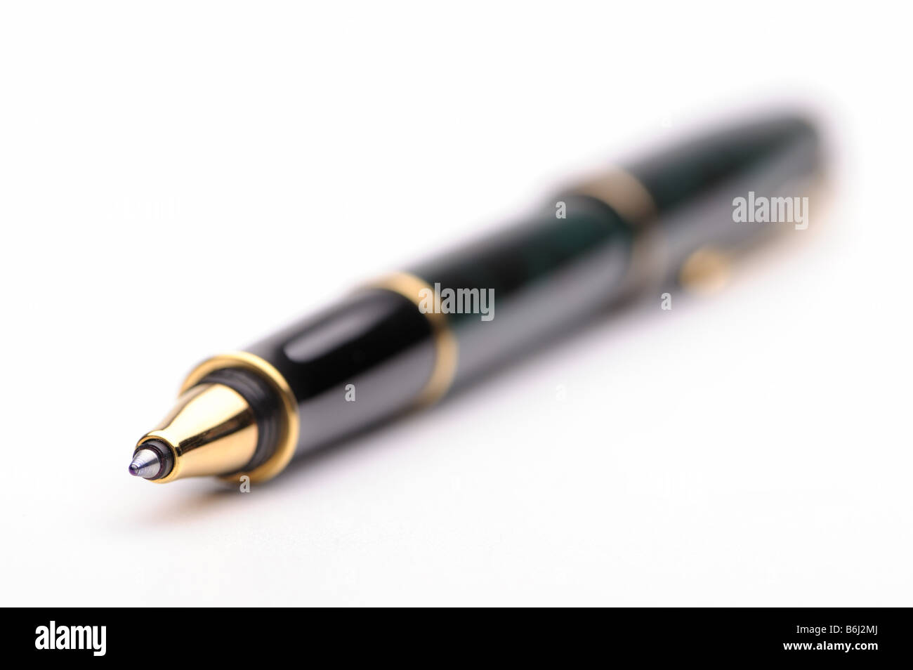 Pen on a white background Stock Photo - Alamy