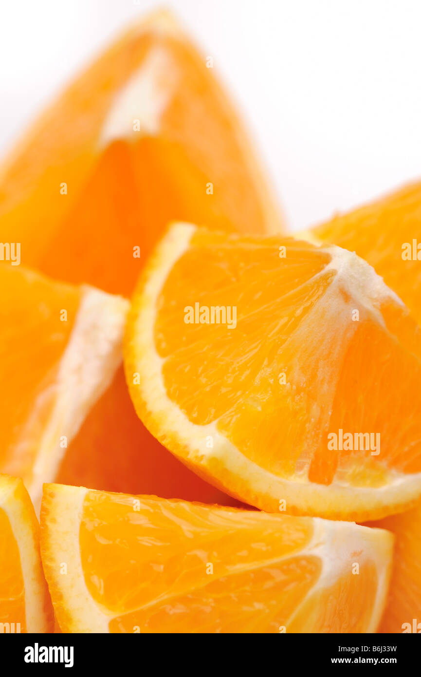 Sliced oranges on a white background Stock Photo - Alamy