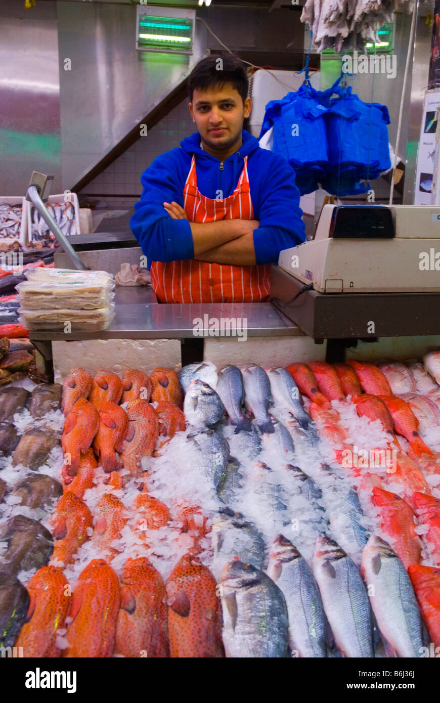 Fish seller in Brixton London England UK Stock Photo - Alamy
