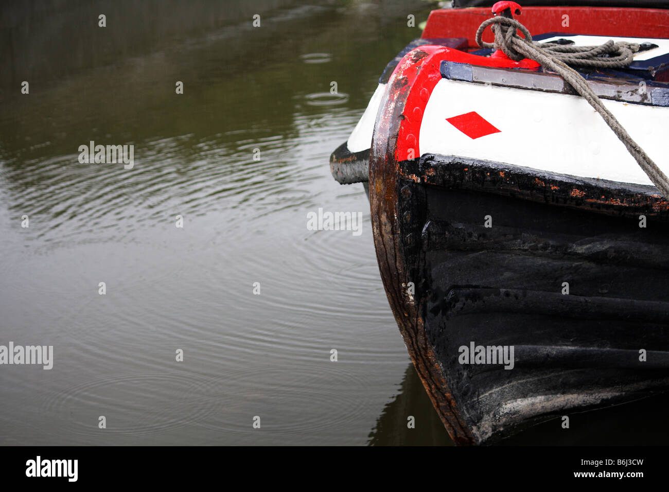 The front section of an old barge moored on a canal Stock Photo - Alamy