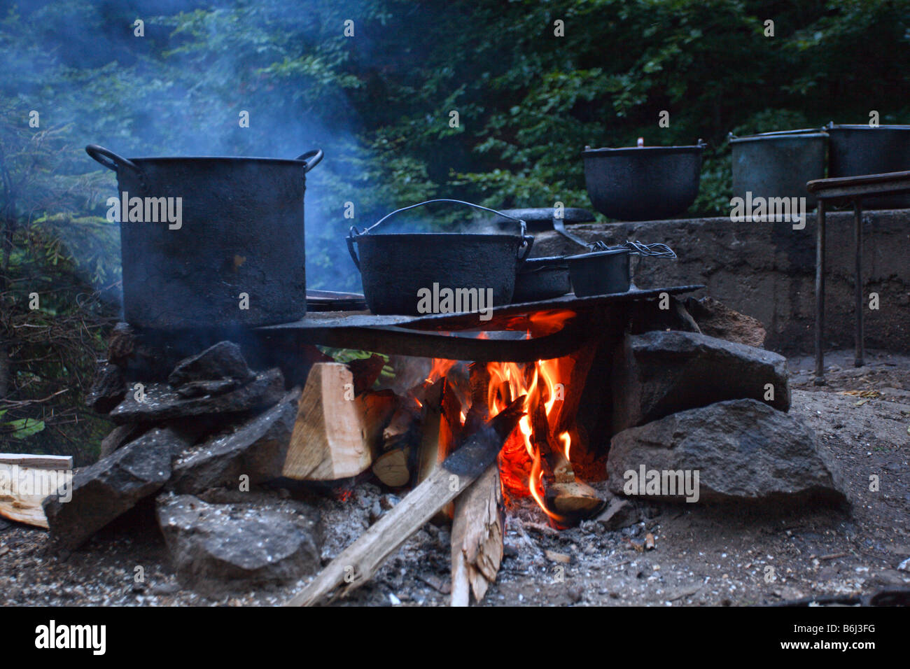 woodcutter campfire in romanian forest Stock Photo - Alamy