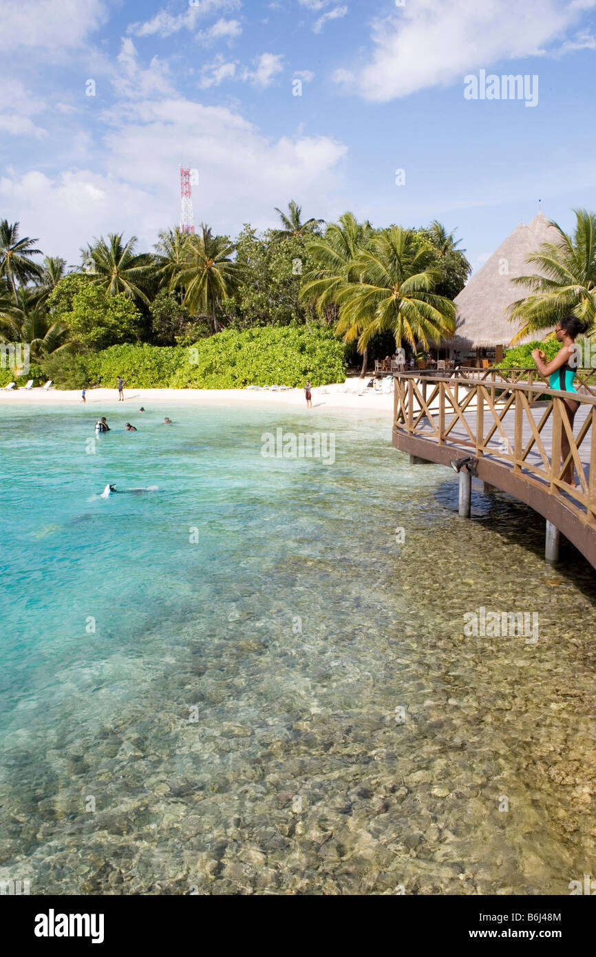 A photograph of the beach and shallow water at Bandos Island (in The ...