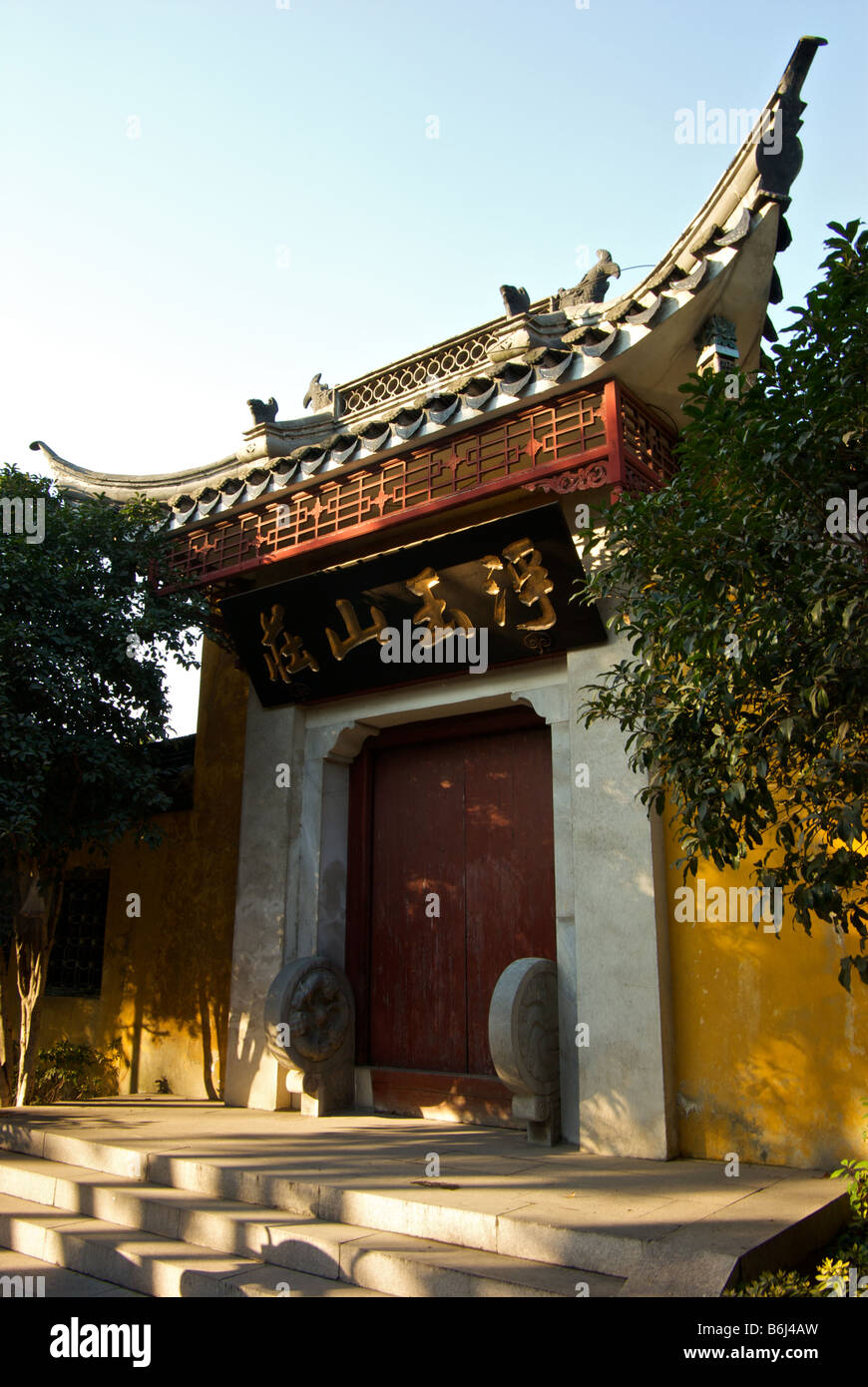 Elaborate gate leading into Tang Dynasty Zhenjiang Buddhist Temple ...