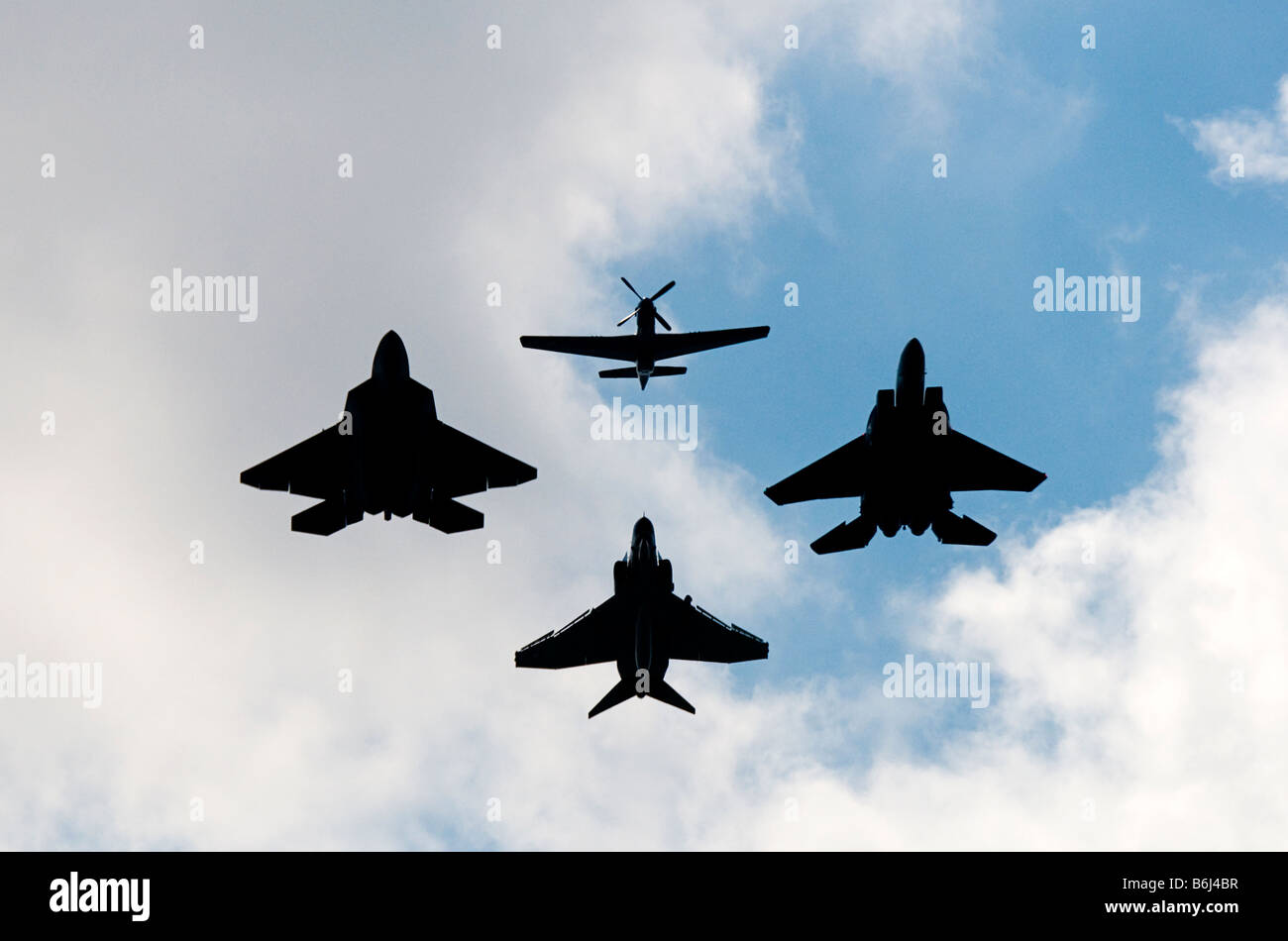 Four Generations of USA Military Aircraft Silhouetted in Formation ...