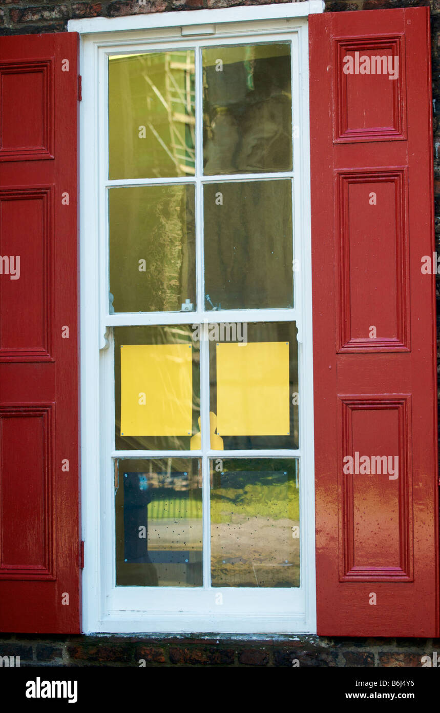 Red shuttered window in York Stock Photo - Alamy