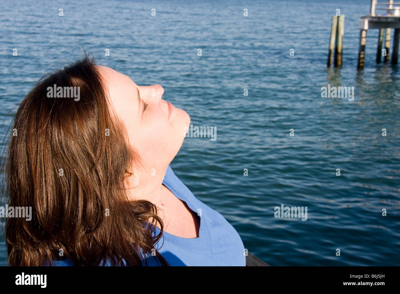 Beautiful plus sized model soaking up the sun on vacation Stock Photo ...