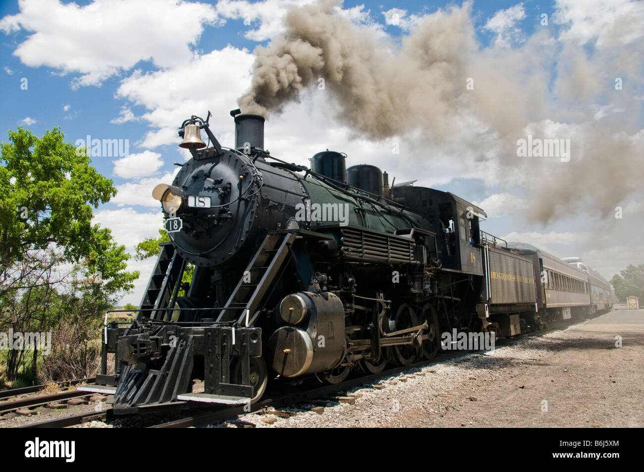 Old fashioned vintage locomotive train engine moving on tracks Stock ...