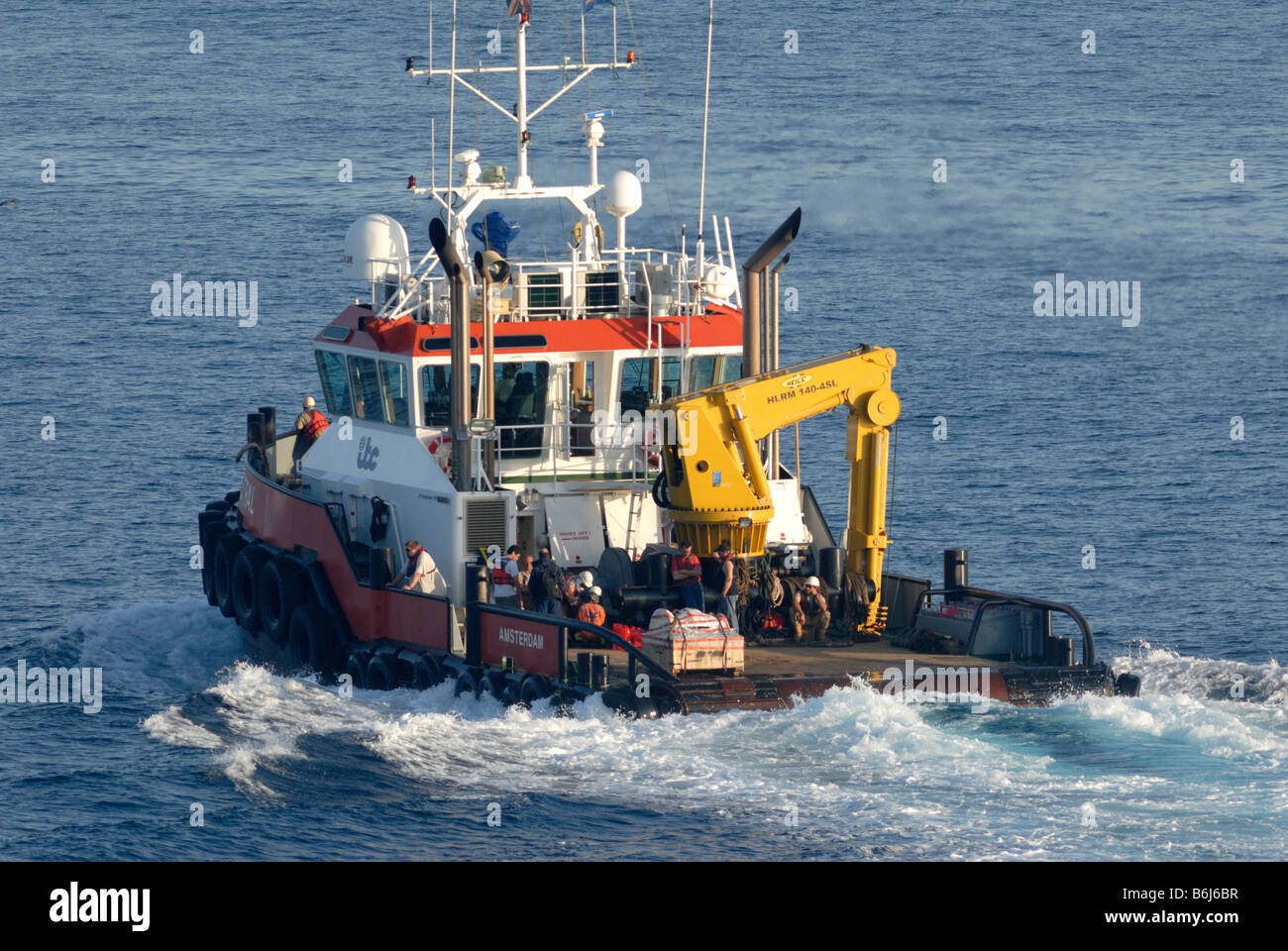 Dutch registered sea tug heading out to sea Stock Photo - Alamy