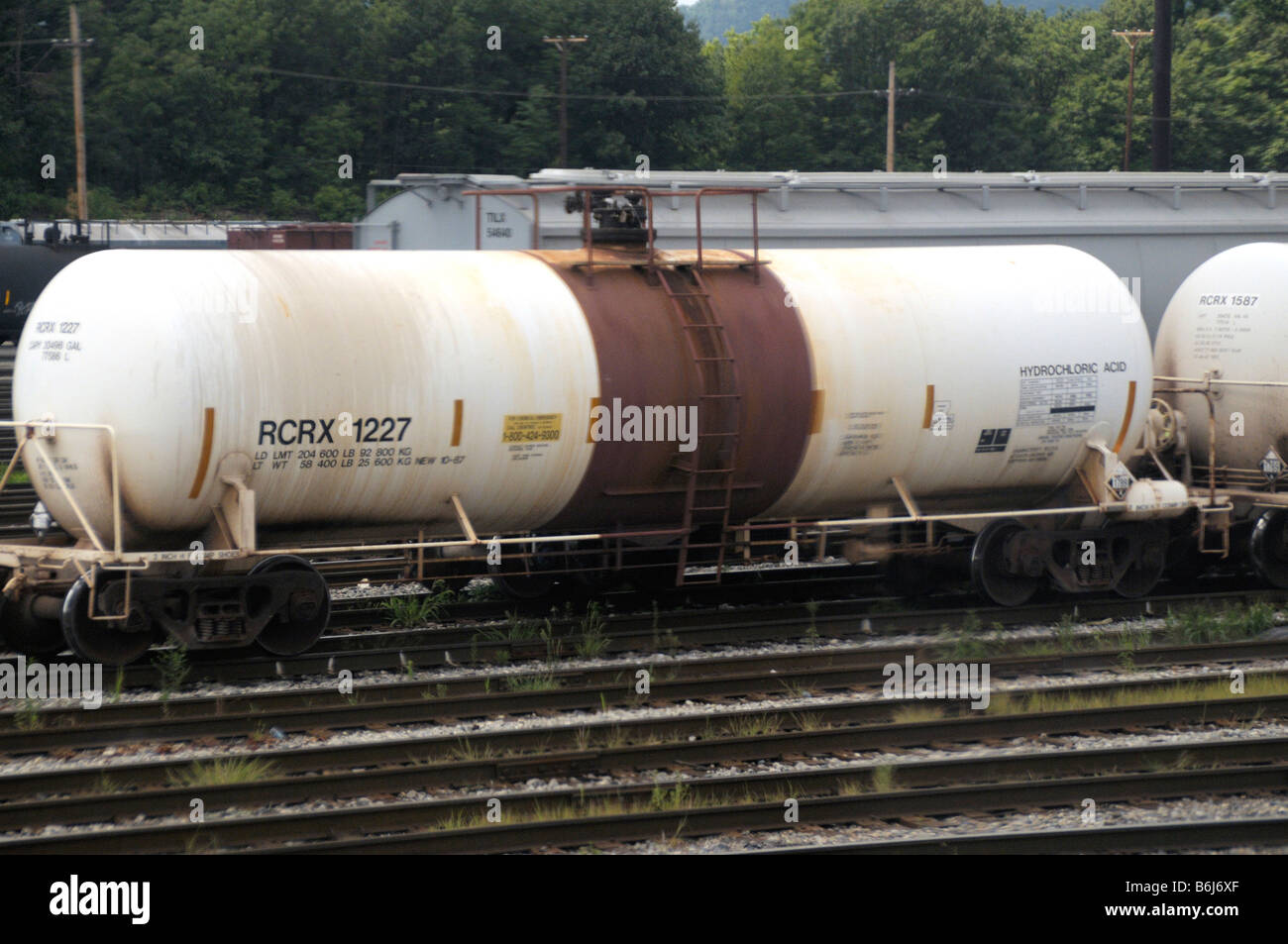 rail car full of hydrochloric acid in train yard in Md Stock Photo - Alamy