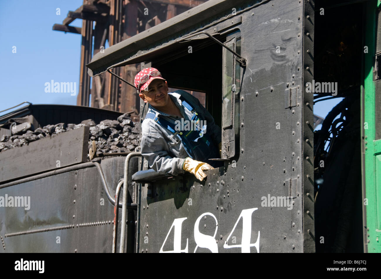 Old fashioned vintage locomotive train engine moving on tracks Stock ...