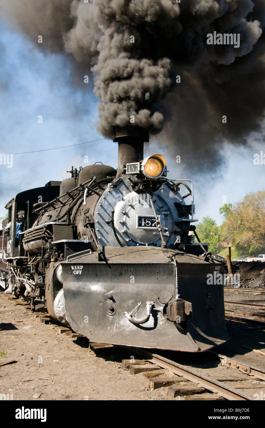 Old fashioned vintage locomotive train engine moving on tracks Stock ...
