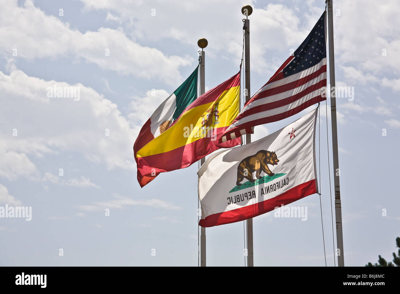 American Californian flags on the grounds of Mission San Luis Rey in ...