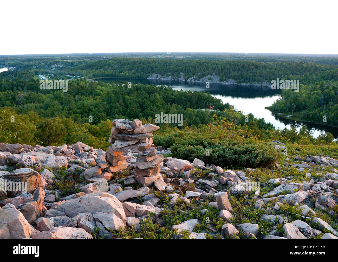 This Inuit inukshuk overlooks Ranger bay, French River, Ontario, Canada ...