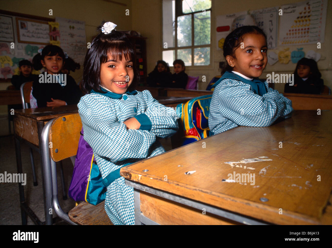 Kuwait City School Children Sitting At Desk Stock Photo - Alamy