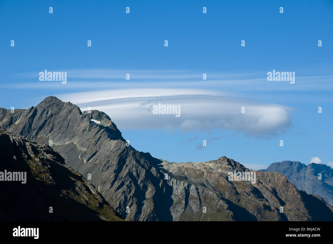 Lenticular Cloud Over Mountains High Resolution Stock Photography and ...