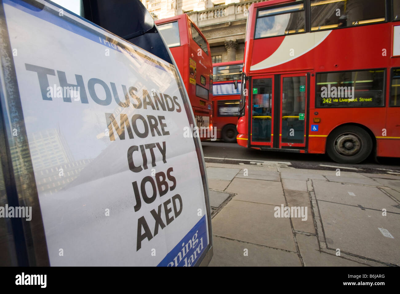 Paper Hoarding announcing more job losses infront of The Bank of ...