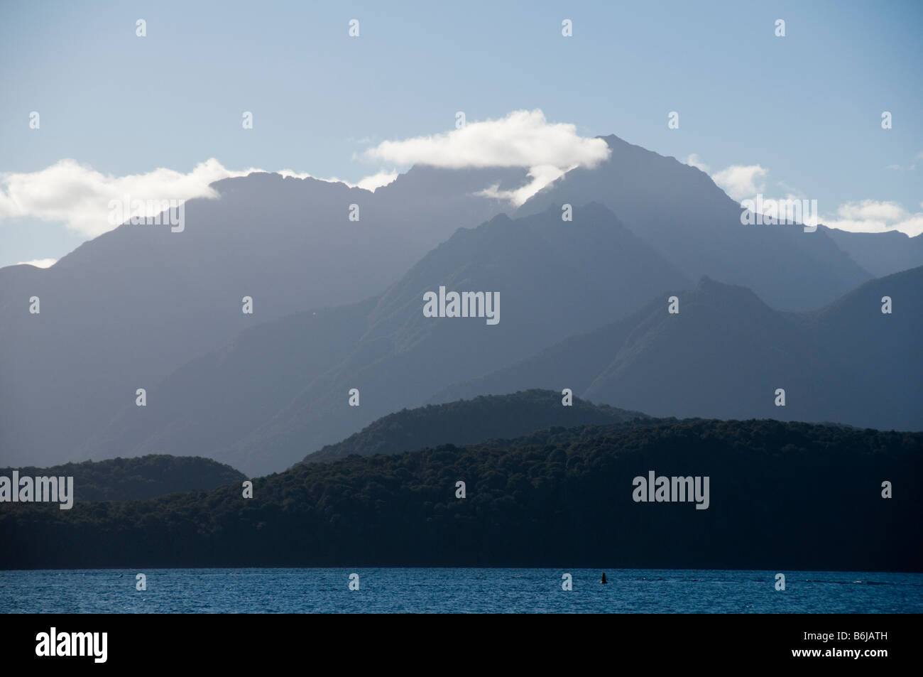 The Murchison Mountains over lake Te Anau, South Island, New Zealand ...
