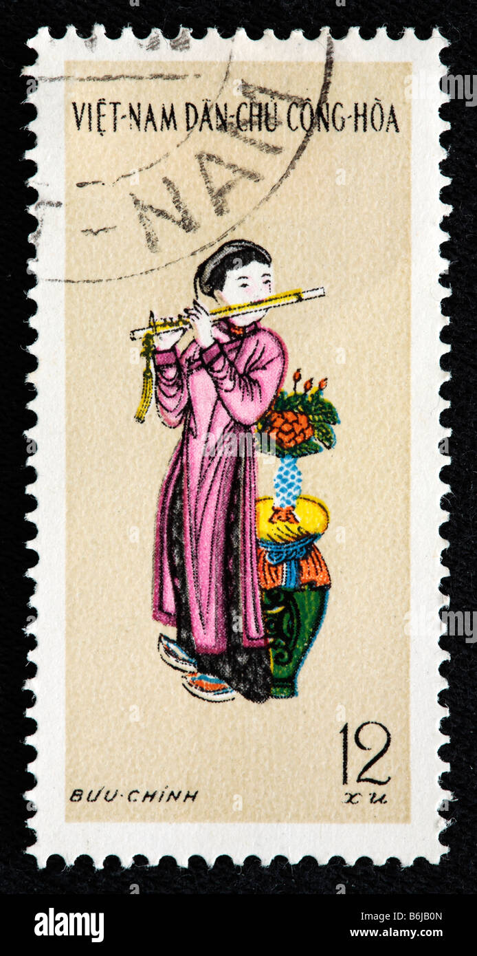 Vietnamese traditional costume, postage stamp, Vietnam Stock Photo - Alamy