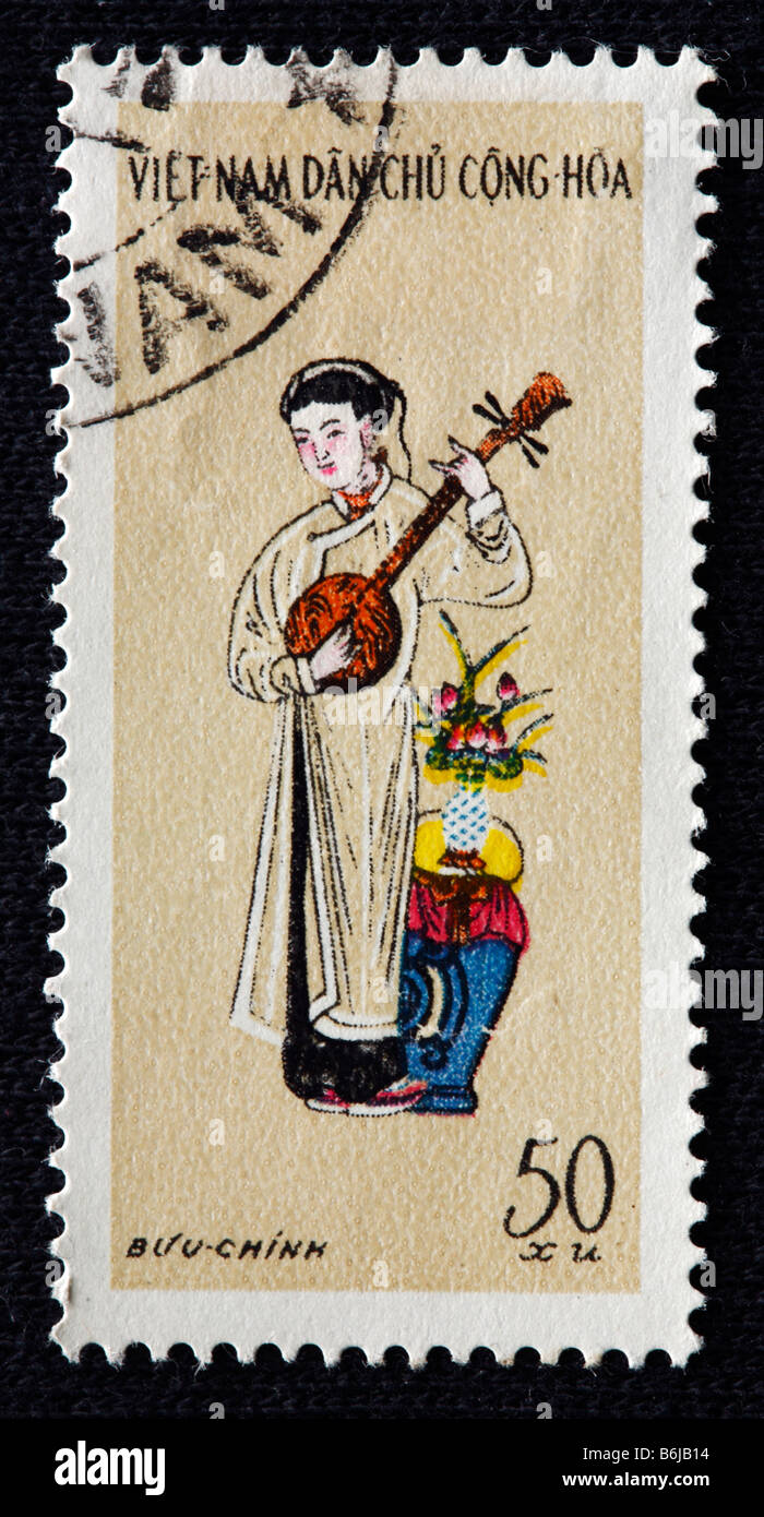 Vietnamese traditional costume, postage stamp, Vietnam Stock Photo - Alamy