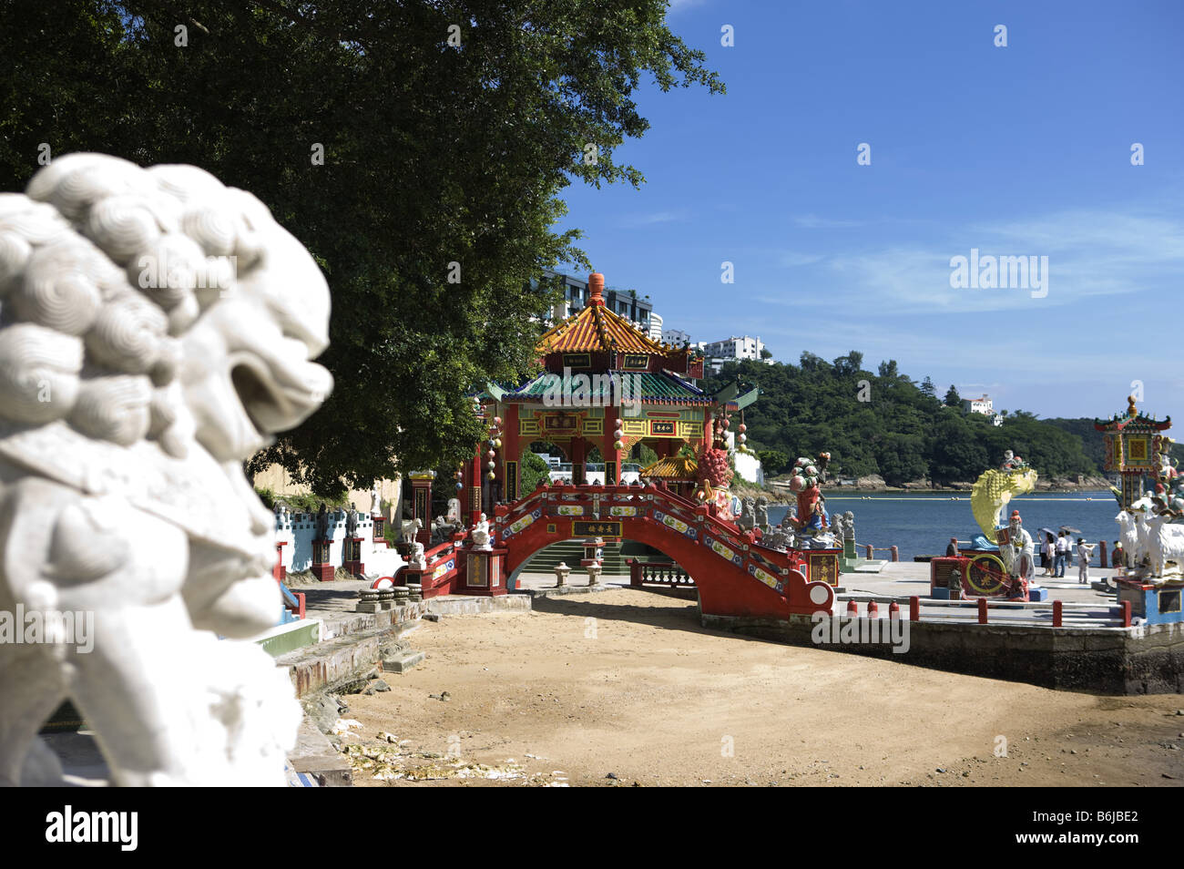 Lion sculpture and a red pavilion on Repulse Bay Hong Kong Stock Photo ...