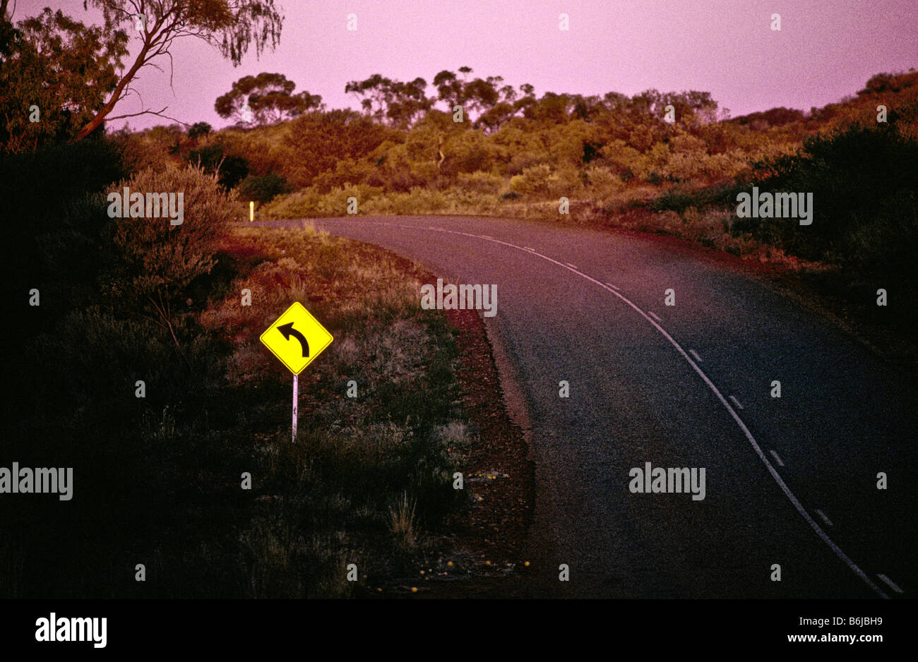 Warning road sign indicating curve hi-res stock photography and images ...
