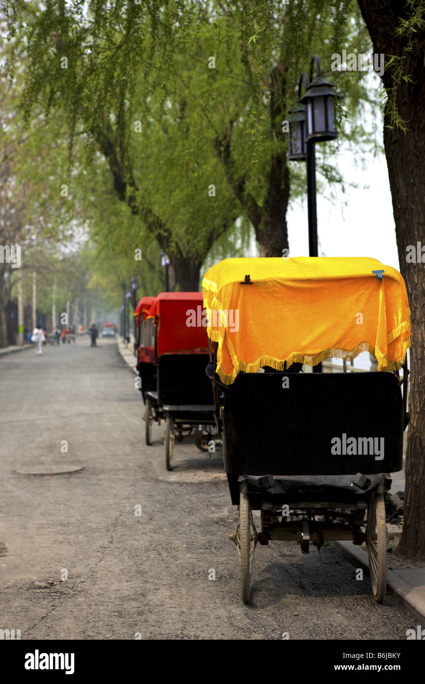 Rickshaw parking in street Stock Photo - Alamy