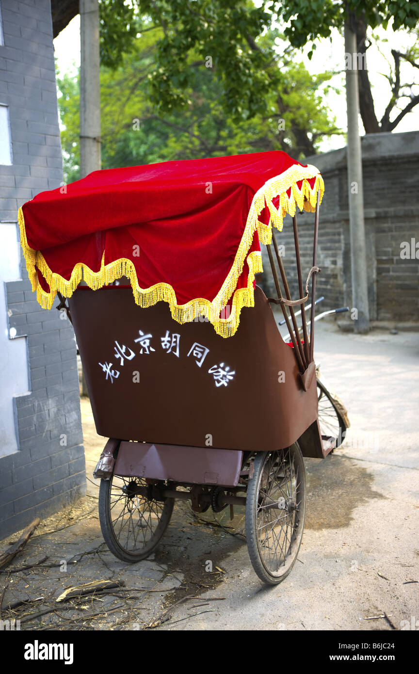 Rickshaw parking in the street Stock Photo - Alamy