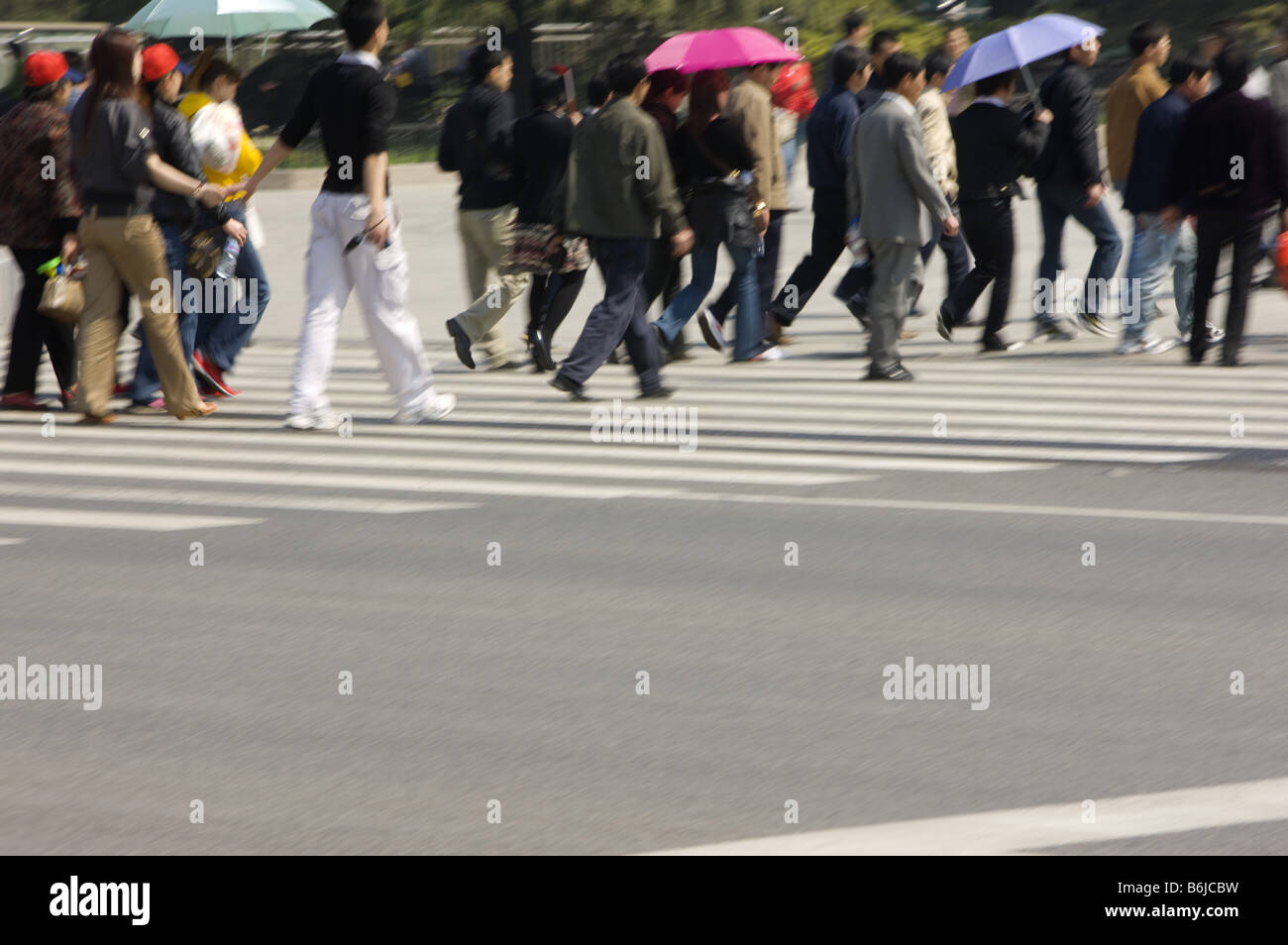 China Beijing Pedestrians walking on sidewalk Stock Photo - Alamy
