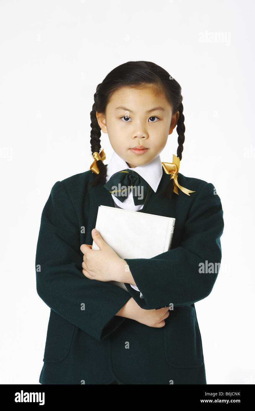 Girls dressed in school uniforms hi-res stock photography and images ...