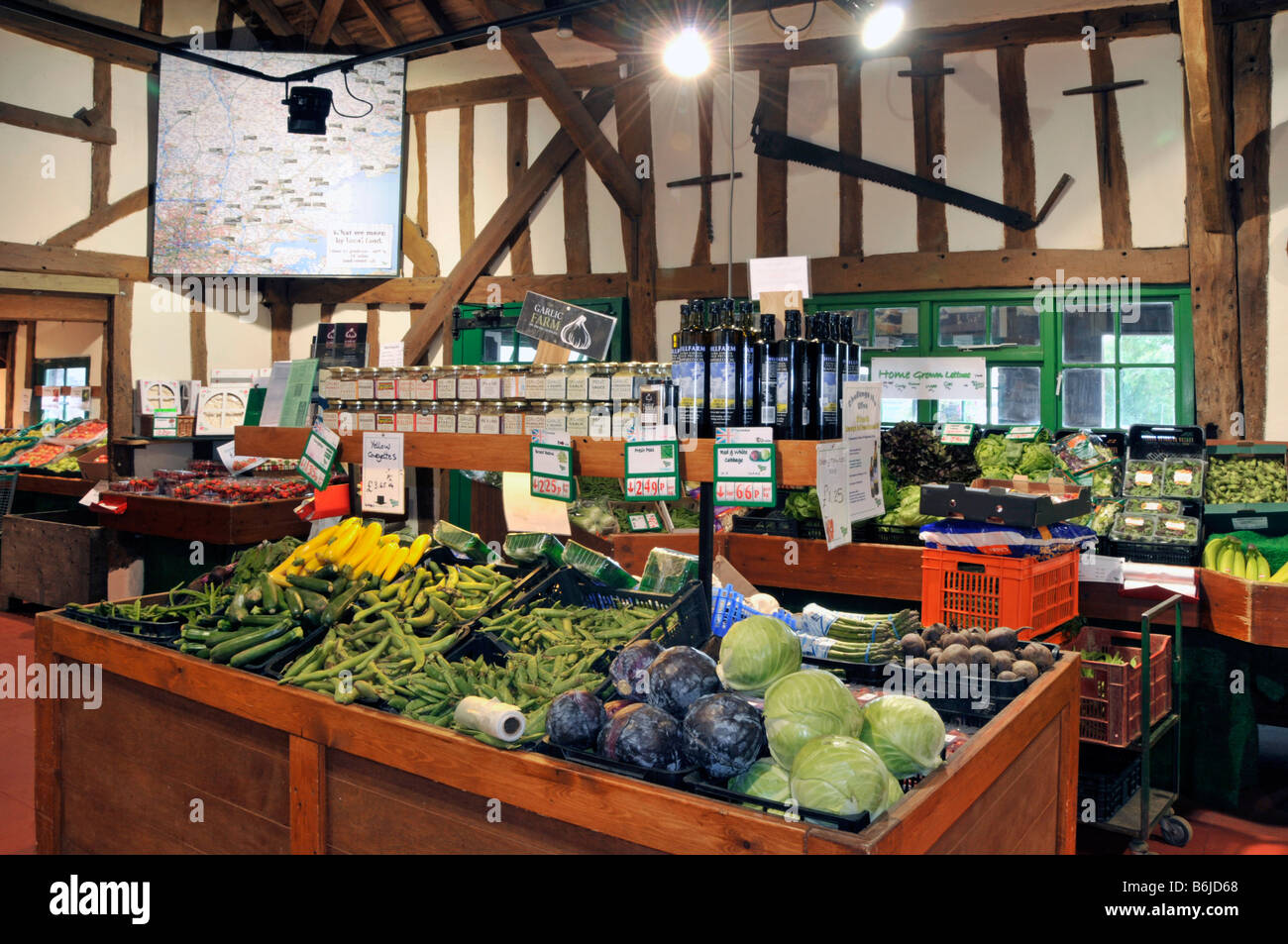 Interior Calcott Hall retail farm shop barn building produce on display ...