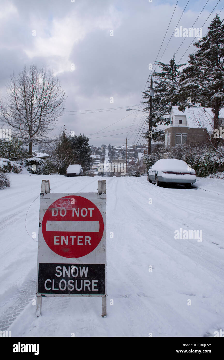 Snow closure do not enter sign at top of steep snow covered hill Mcgraw ...