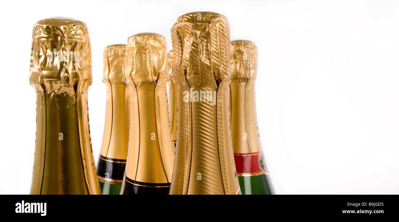 A group of Champagne bottle necks "no branding Stock Photo - Alamy