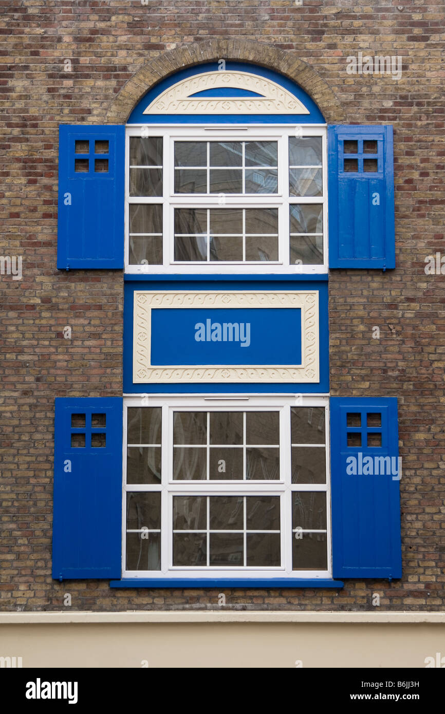 windows with blue shutters in the london docks area, England Stock ...