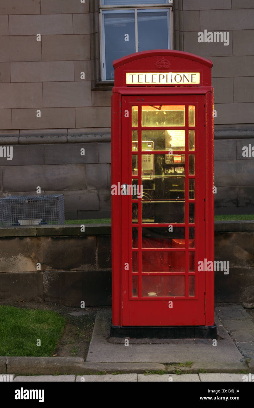 Twilight picture of a traditional red British telephone box Stock Photo - Alamy