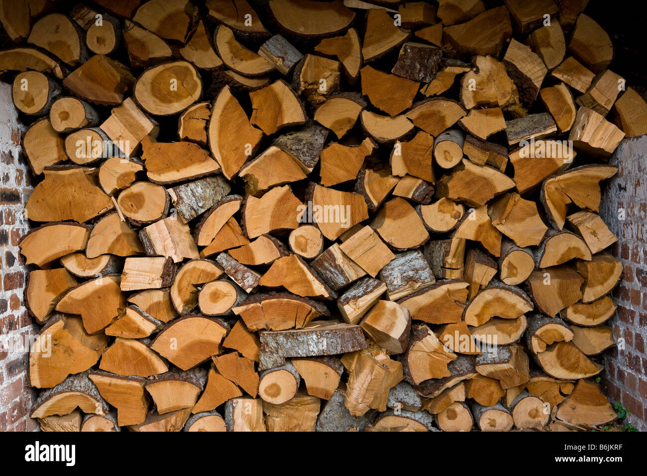 STACKED LOGS IN WOOD STORE RURAL UK Stock Photo - Alamy
