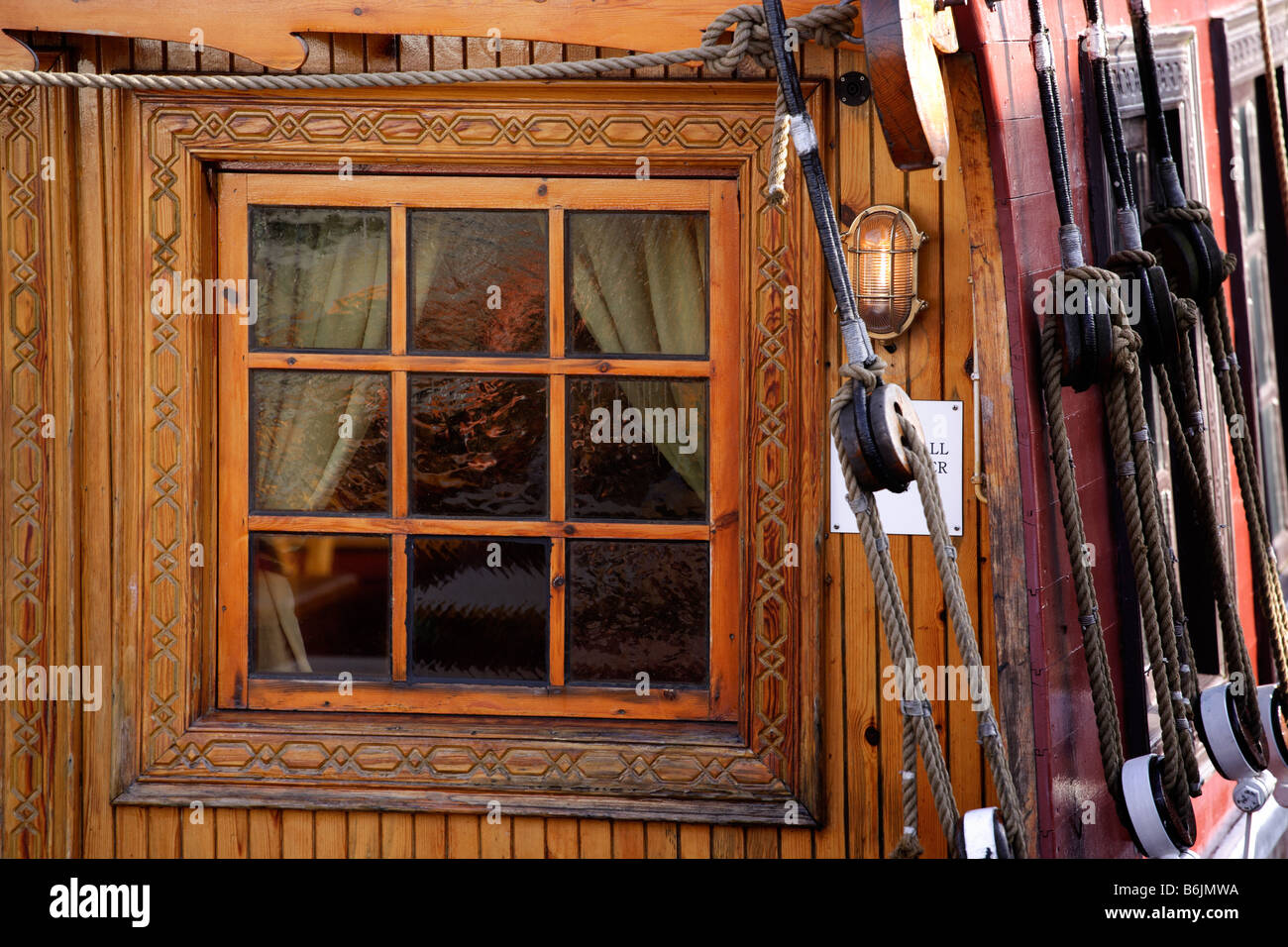 Norway, Oslo, Carved window frame, Old Wooden Cutter at the City Pier ...