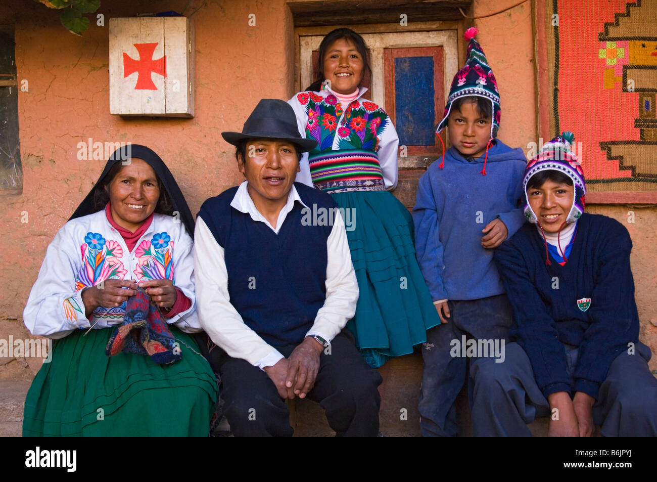 Peru, Lake Titicaca, Isla Amantani, Portrait of family. Credit as ...