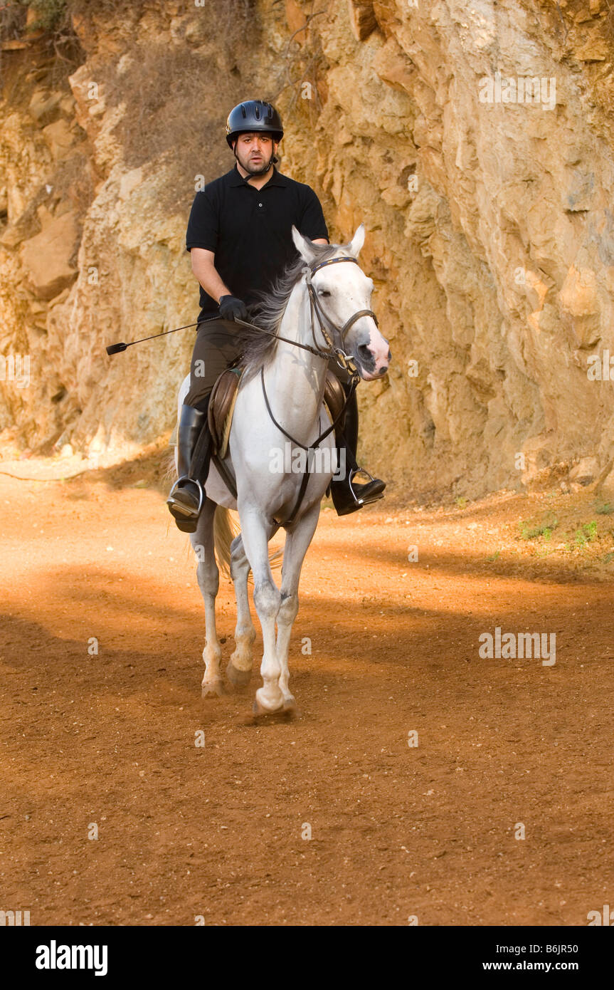 Person riding white horse hi-res stock photography and images - Alamy