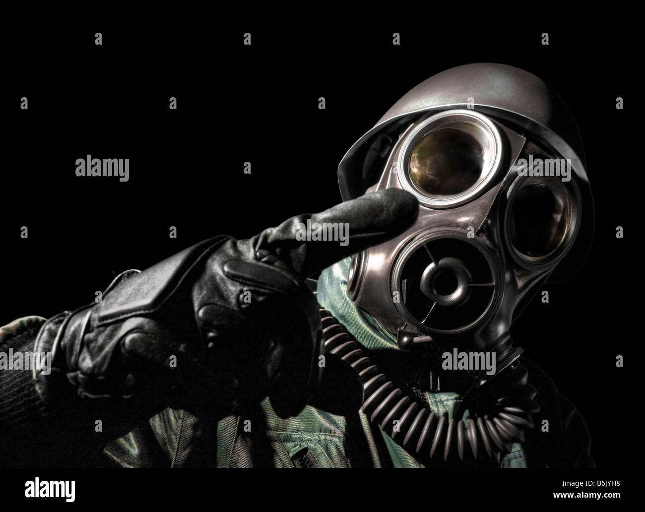 Gas masked man pointing Stock Photo - Alamy