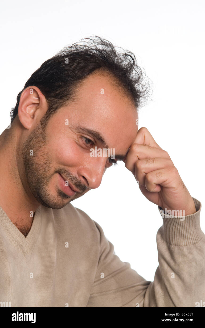 Man head in hands smiling Stock Photo - Alamy
