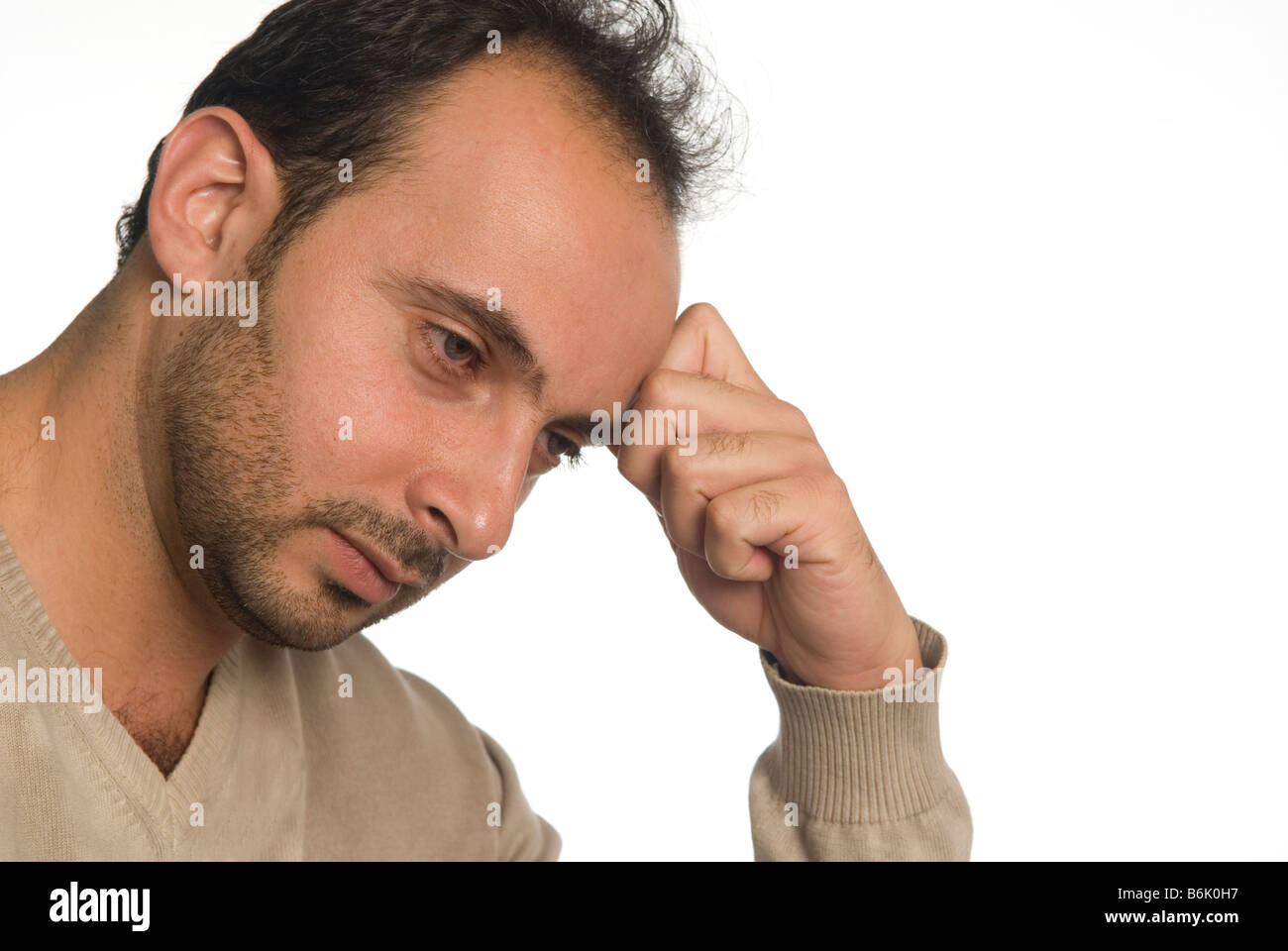 Man head in hand Stock Photo - Alamy