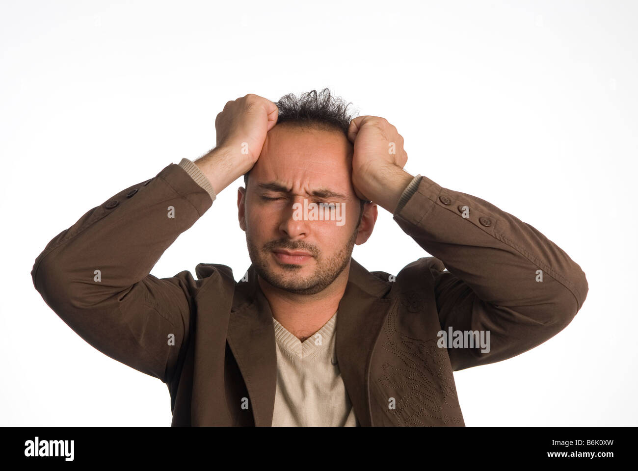 man pulling his hair Stock Photo - Alamy